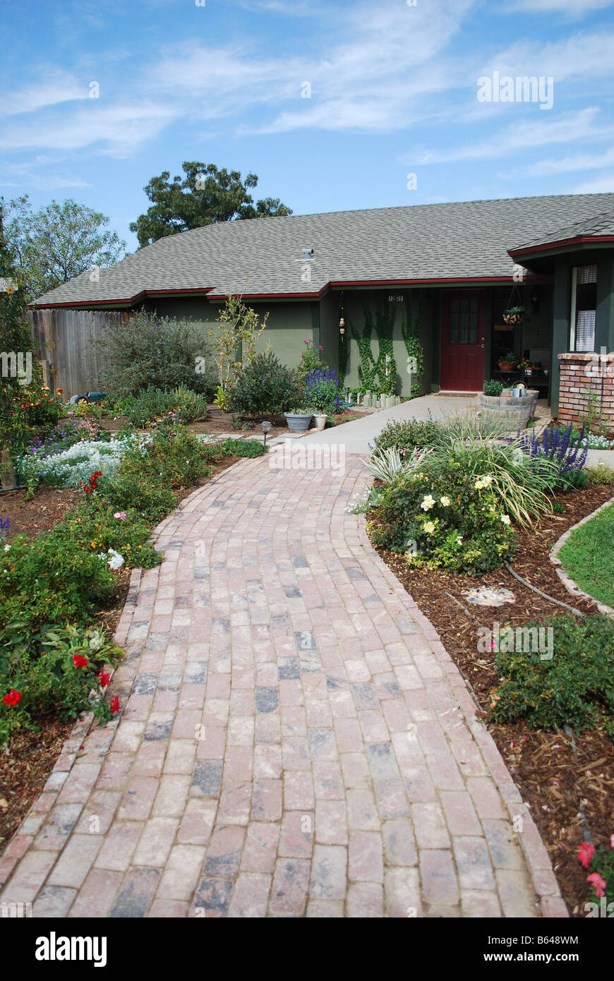 brick path in a cottage garden Stock Photo - Alamy