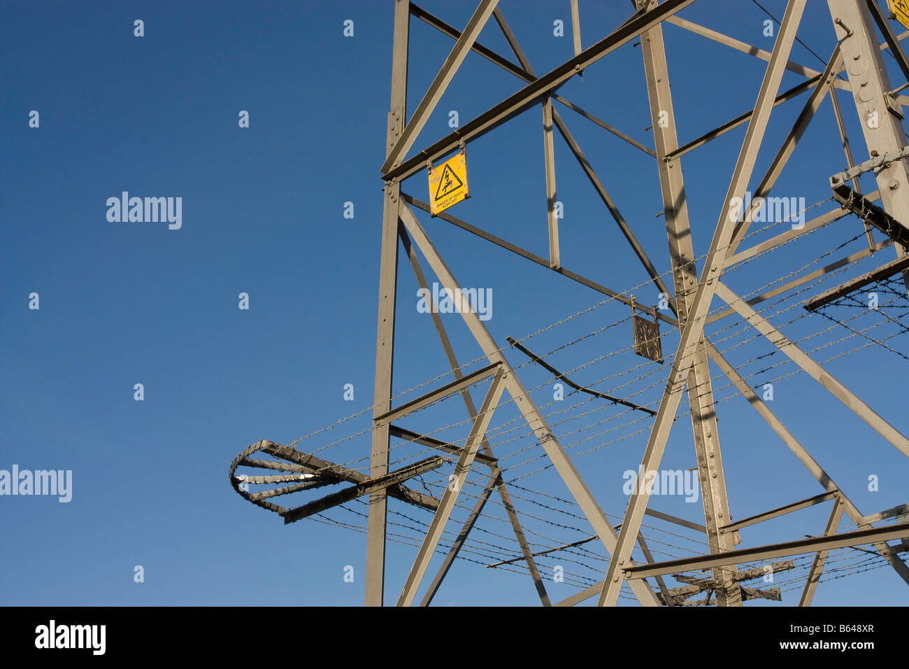 Tight shot of warning sign and barbed wire to prevent unauthorised ...