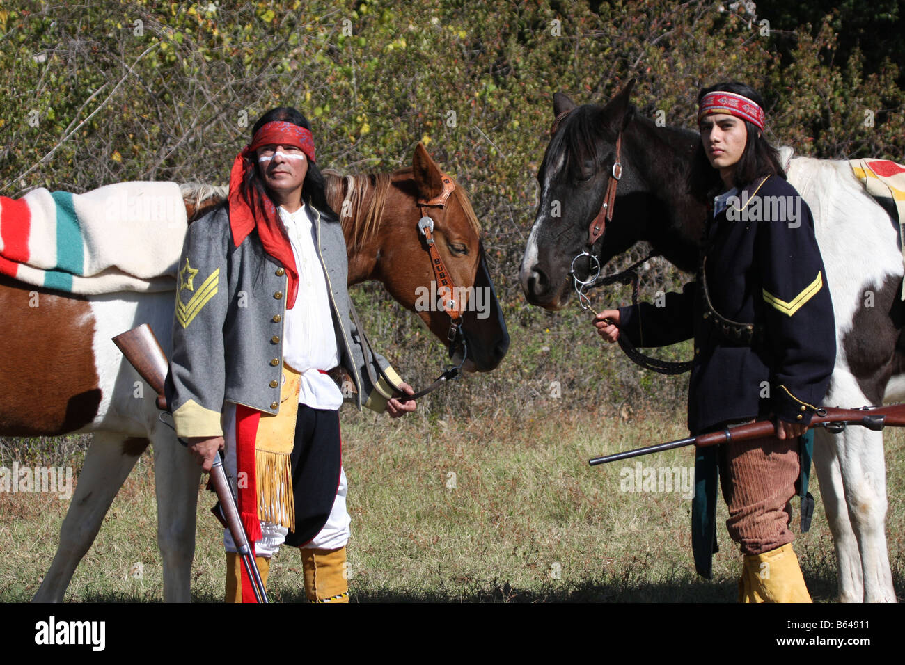 Two Apache Native American Indians with their horses Stock Photo - Alamy