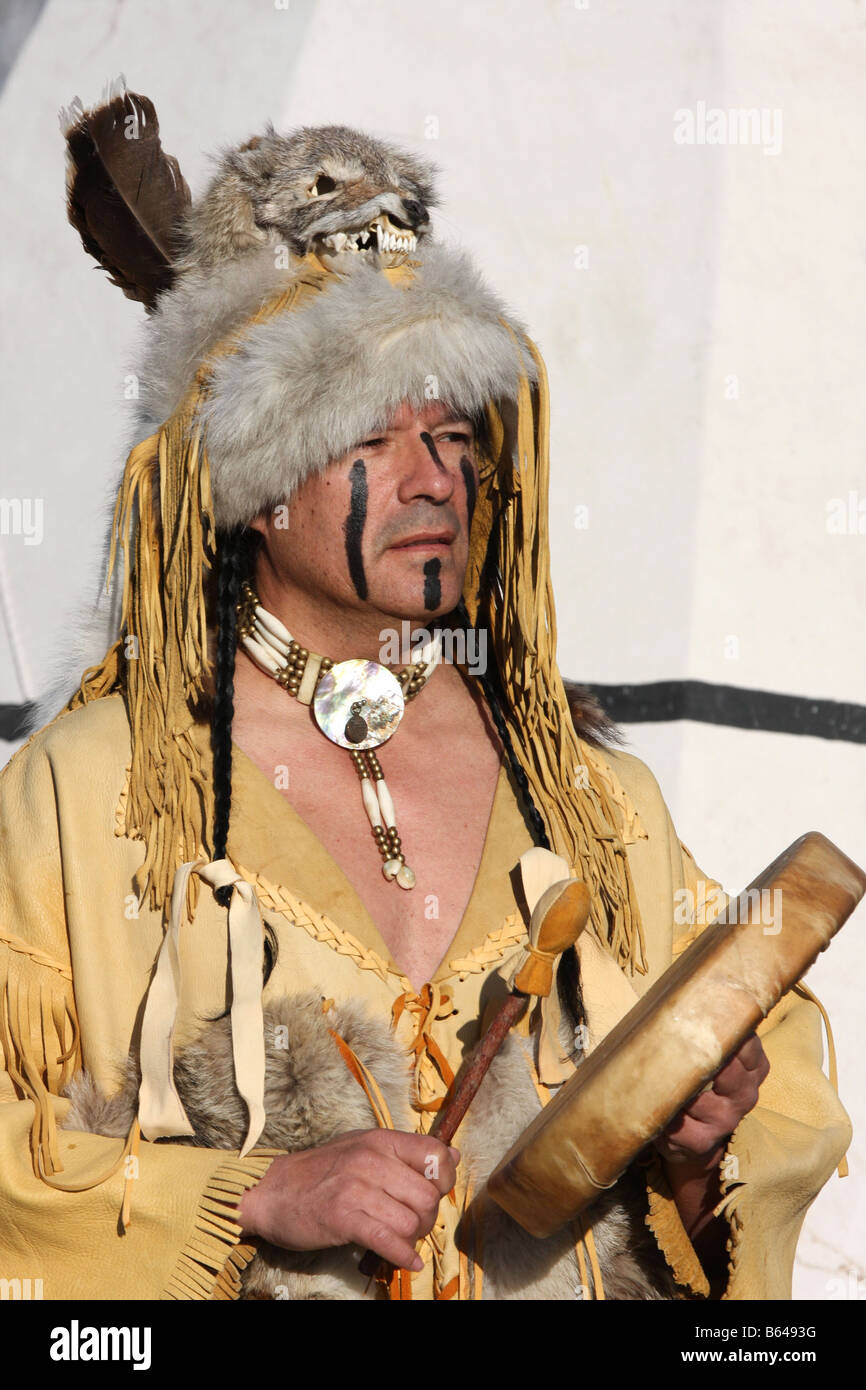 Apache Native American Indian drumming with a drum Stock Photo - Alamy