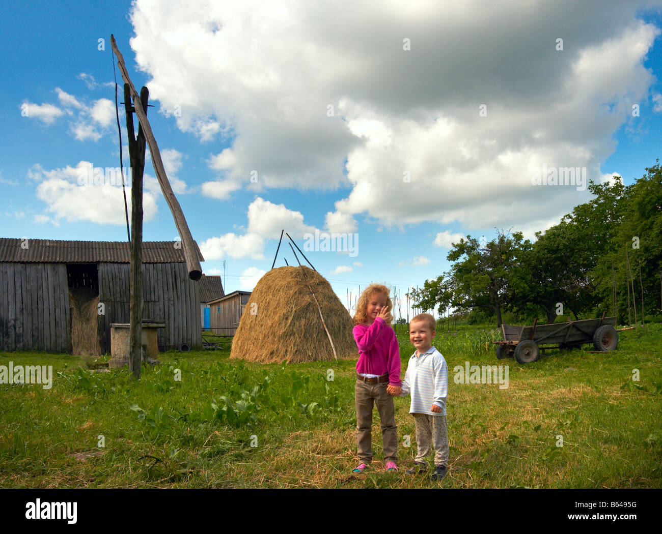 two small children on summer country homestead Stock Photo - Alamy
