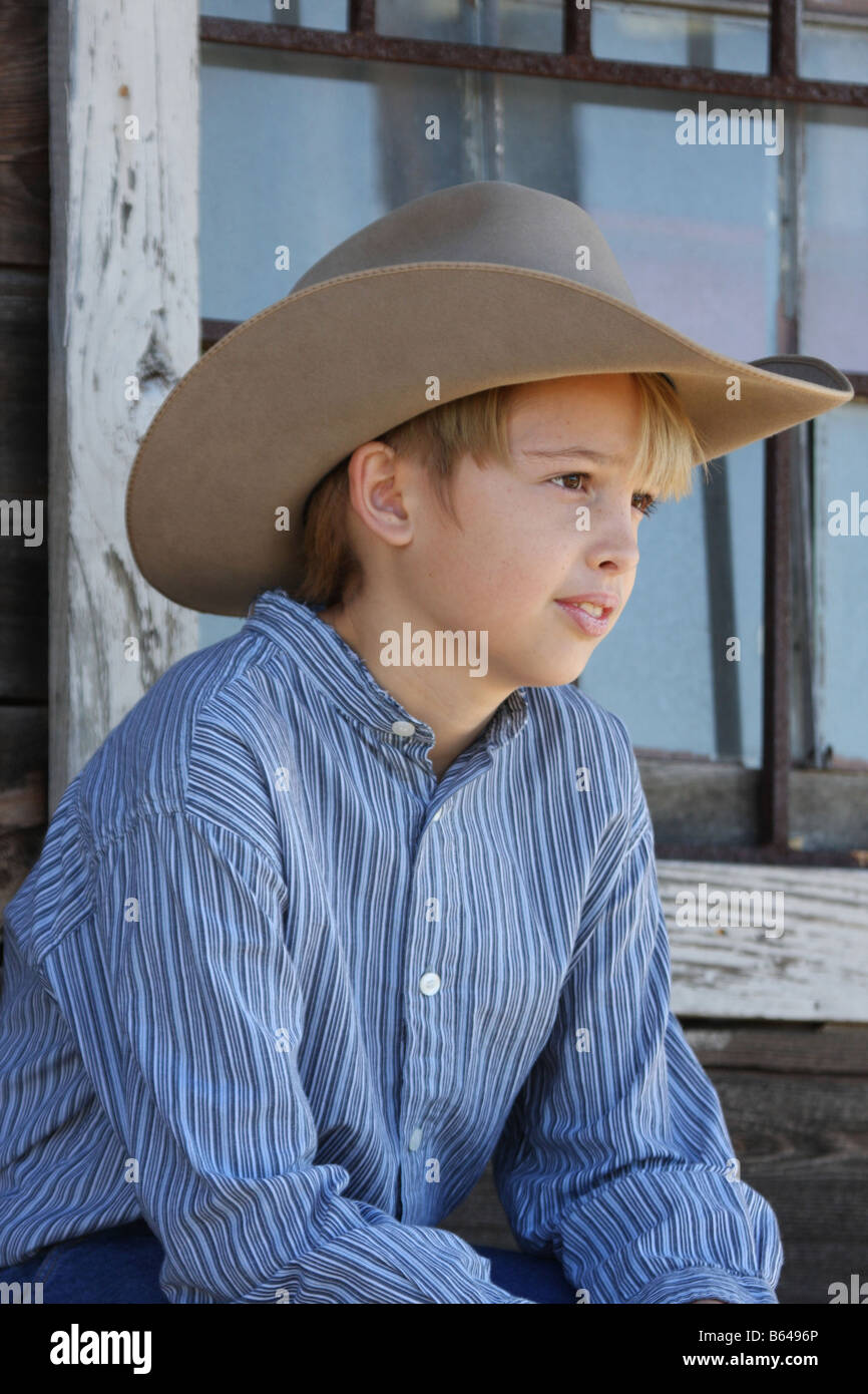 A young cowboy in blue Stock Photo - Alamy