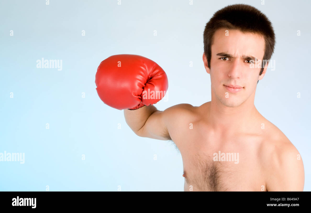 Young boxer ready to punch someone Stock Photo - Alamy
