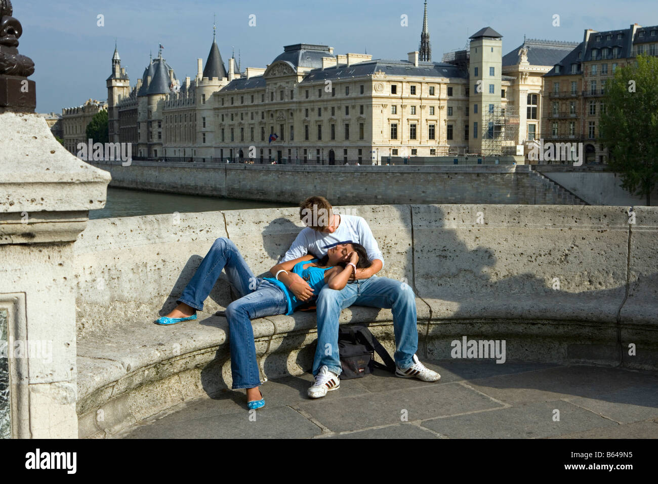 Couple relaxing on bridge over hi-res stock photography and images - Alamy