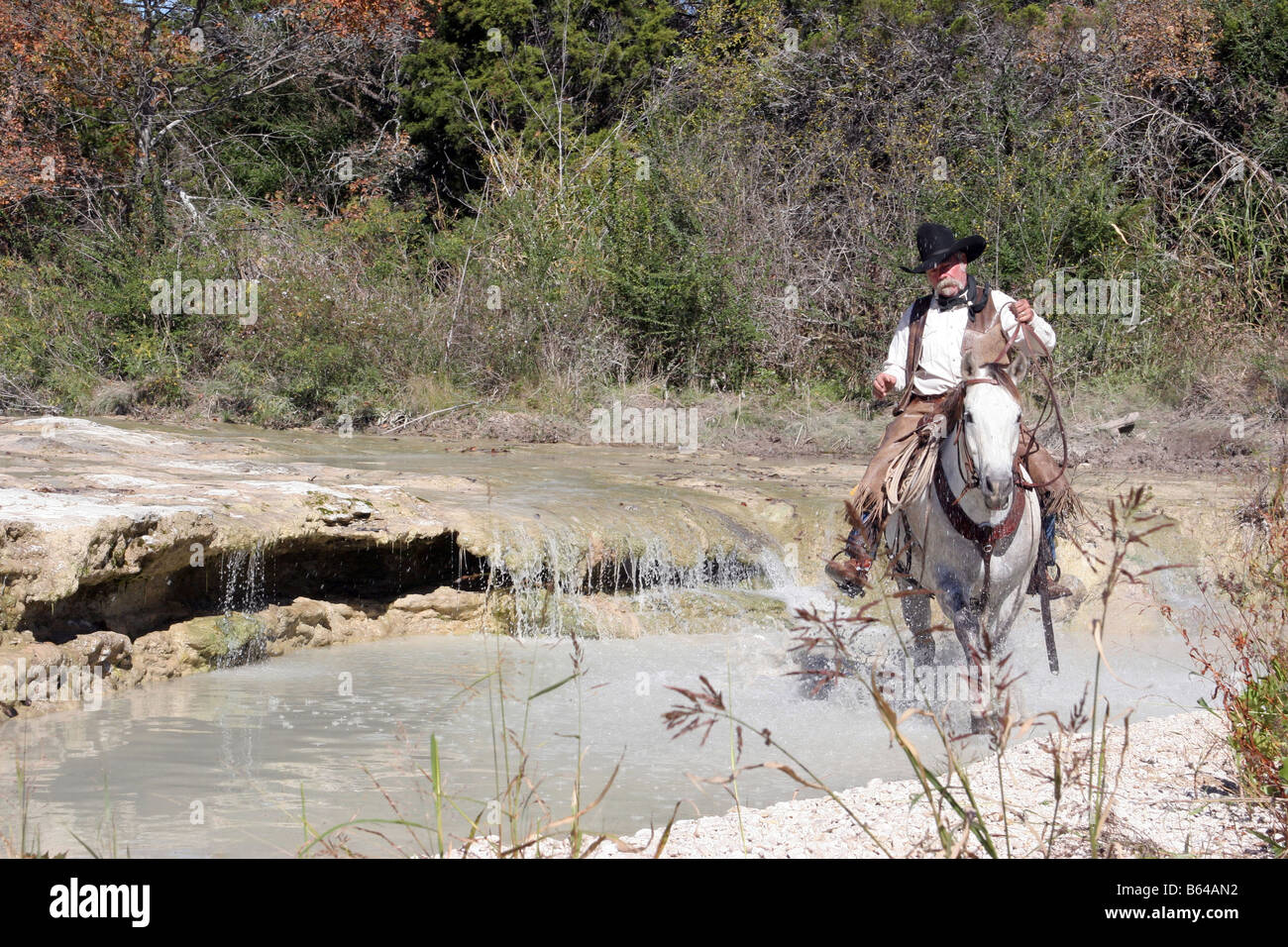 Cowboy crossing river hi-res stock photography and images - Alamy