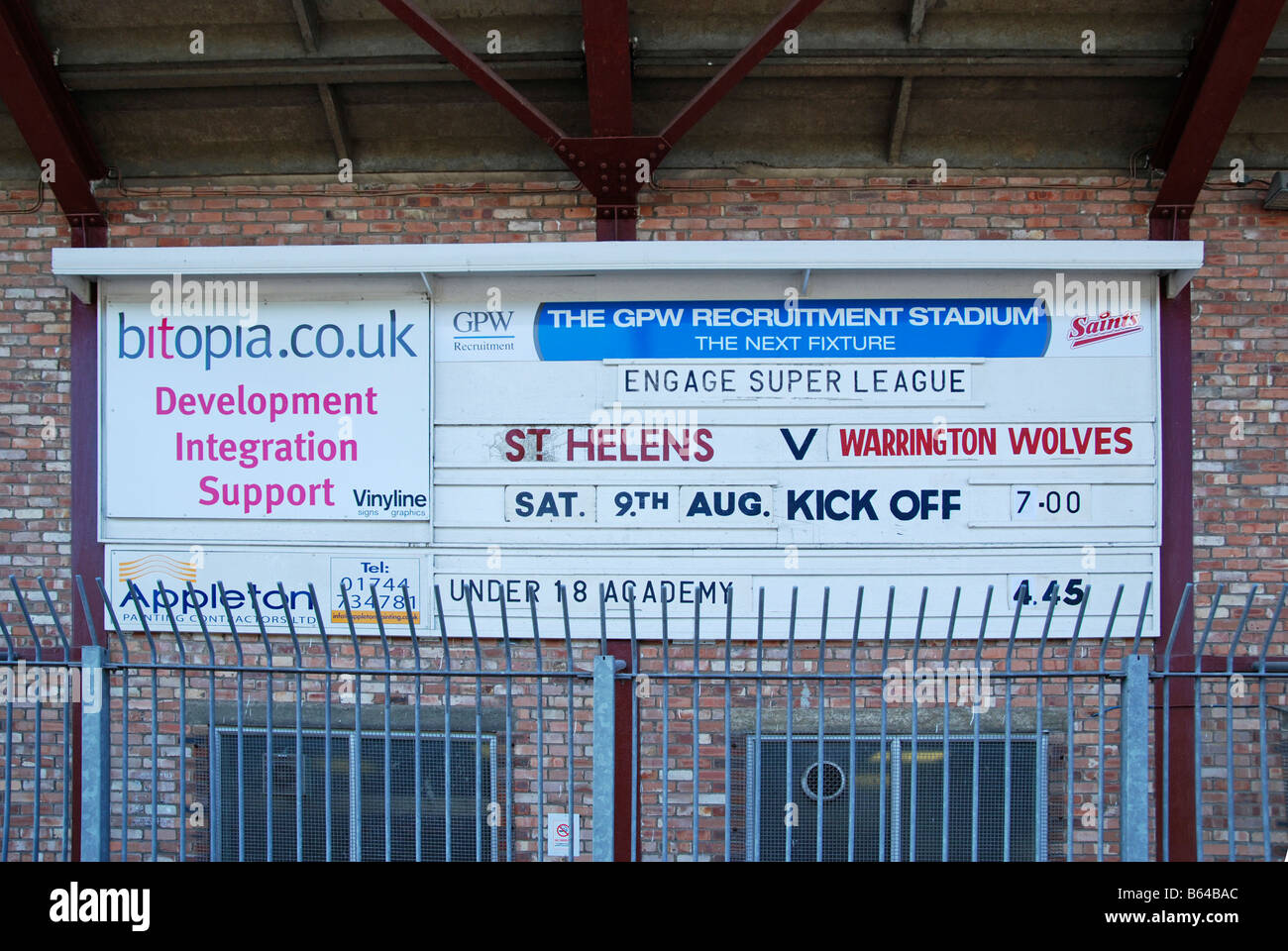 a billboard advertising the next rugby match at knowsley road, the home ...