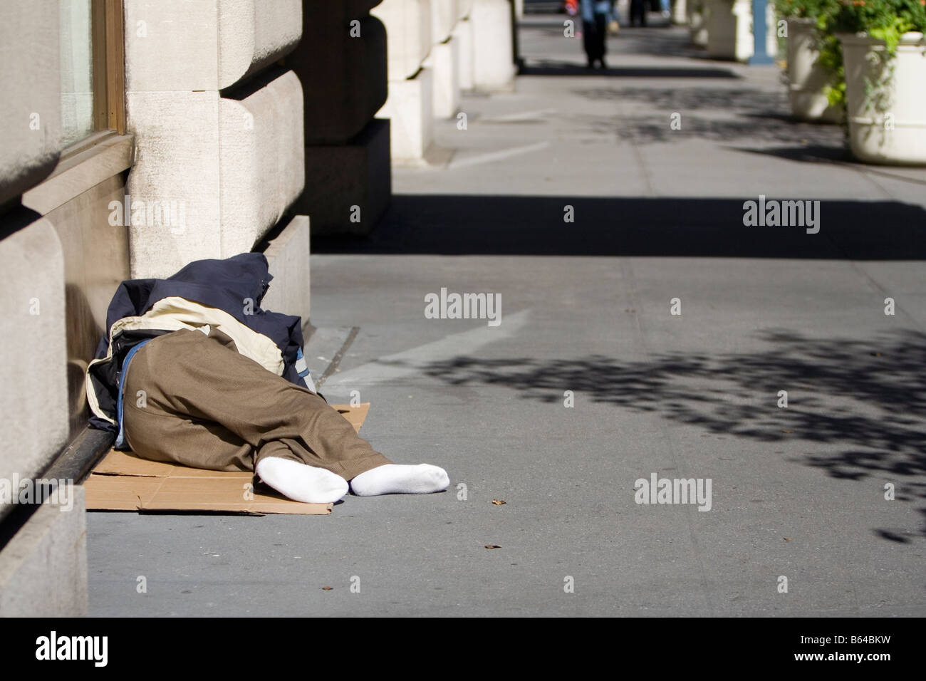 Homeless person sleeping. Manhattan NY USA Stock Photo - Alamy