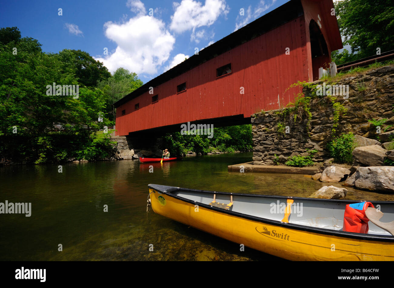Canoeing under the Red Covered Bridge Battenkill river Vermont Stock ...