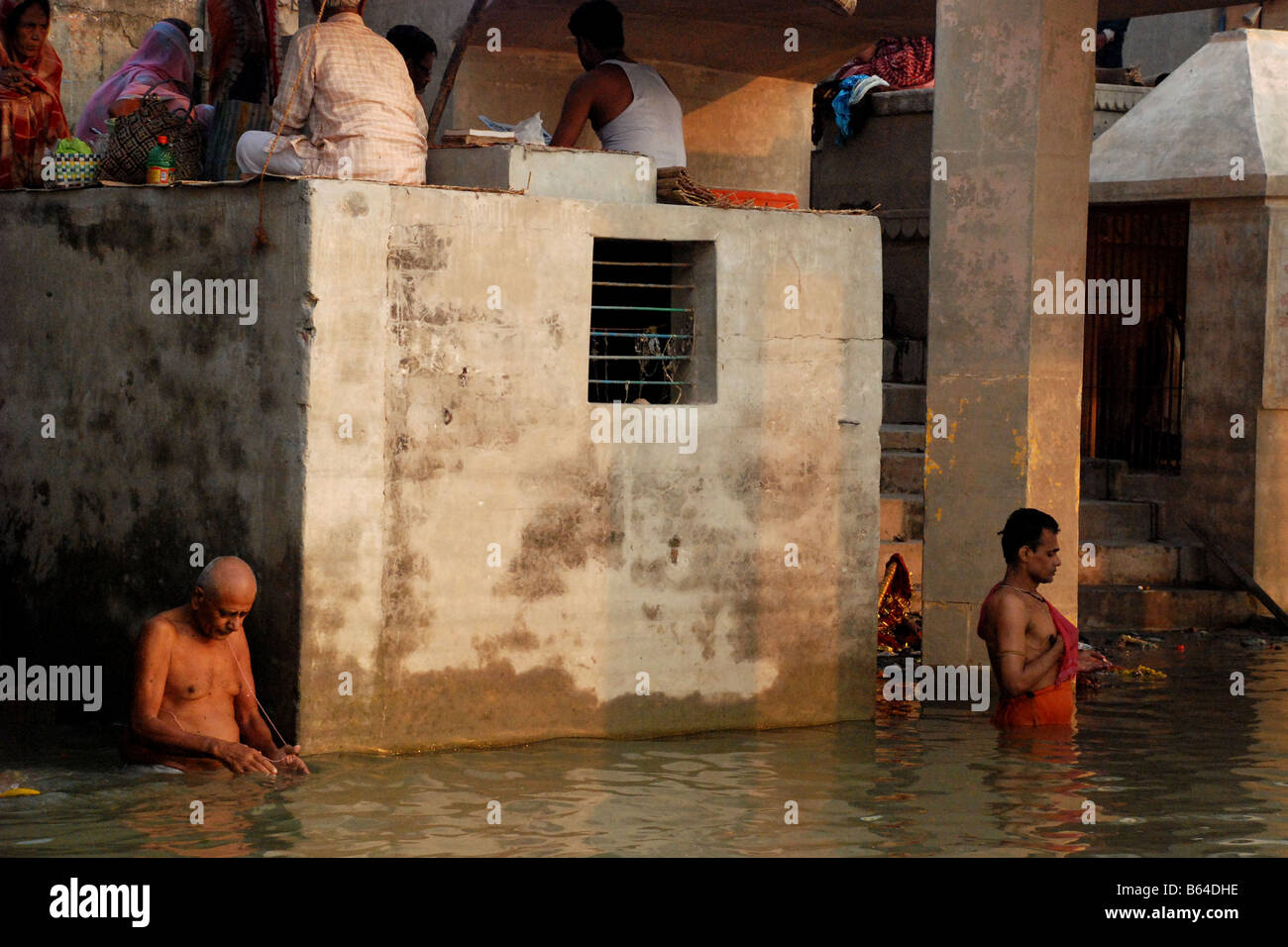 Indian men bathing in ganges hi-res stock photography and images - Alamy