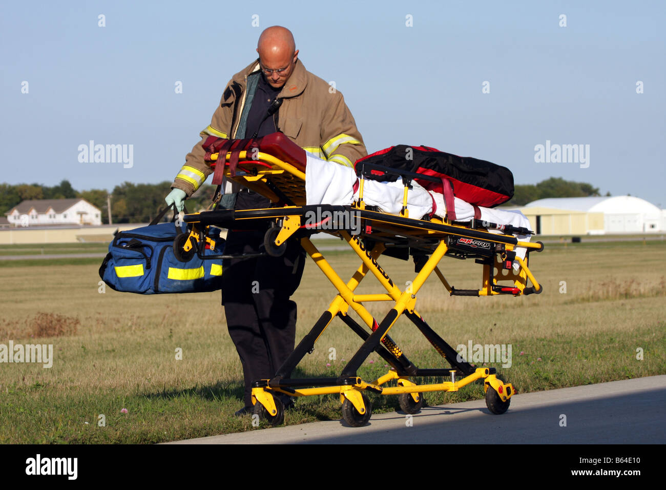An EMS personnel responding to a mass casualty incident at an airport ...