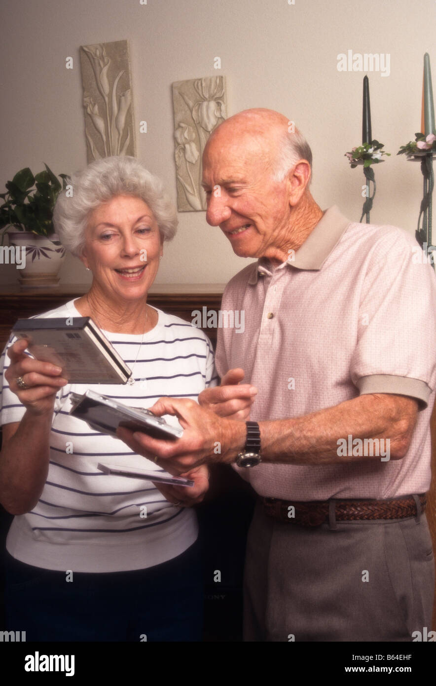 Senior couple maker various choices as a team Stock Photo - Alamy