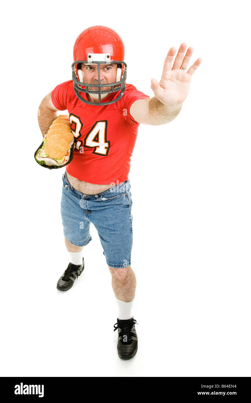 Football player carries a giant sub sandwich like its a foot ball Full ...