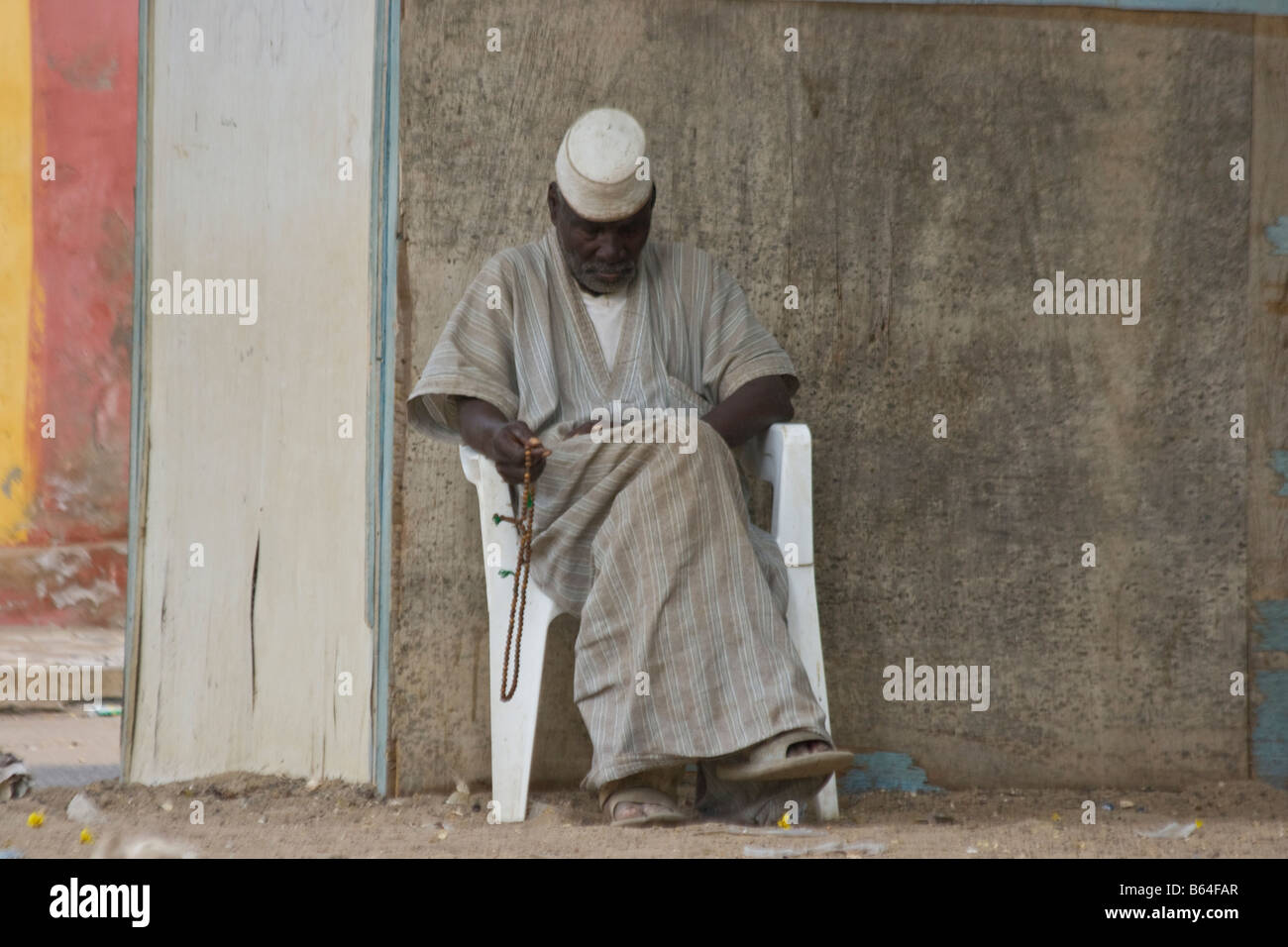 Muslim Man Sleeping in St Louis in Senegal West Africa Stock Photo - Alamy