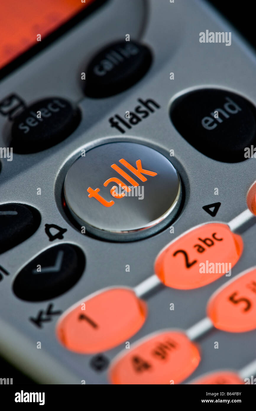 Close up of a telephone's keypad with a 'Talk' button in the middle ...