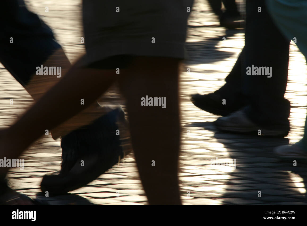 shadow person fast speed feet legs walking in street in town Stock ...