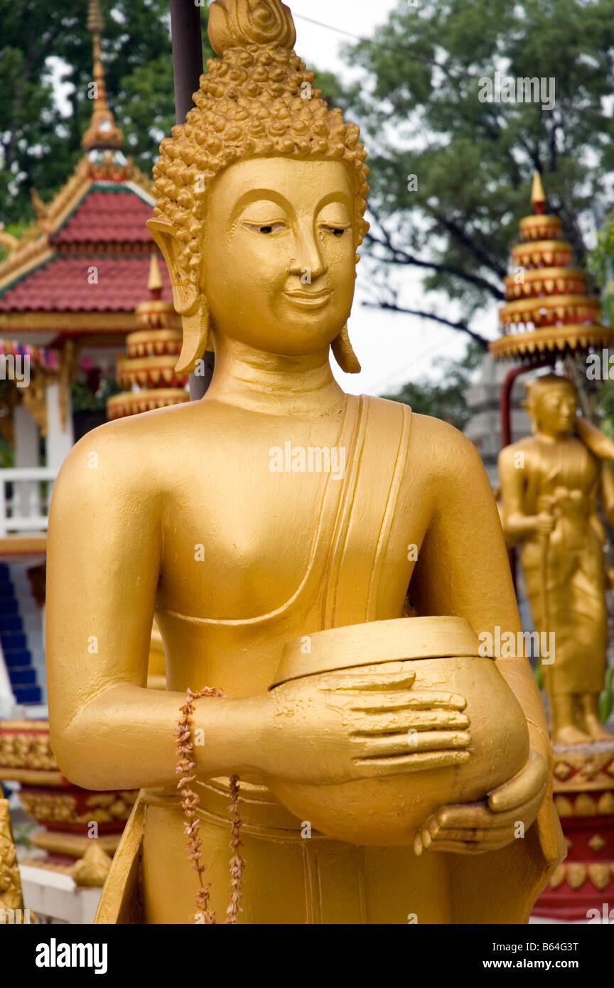 Buhddist statue with begging bowl, Wat Si Saket, Vientiane, Laos Stock ...