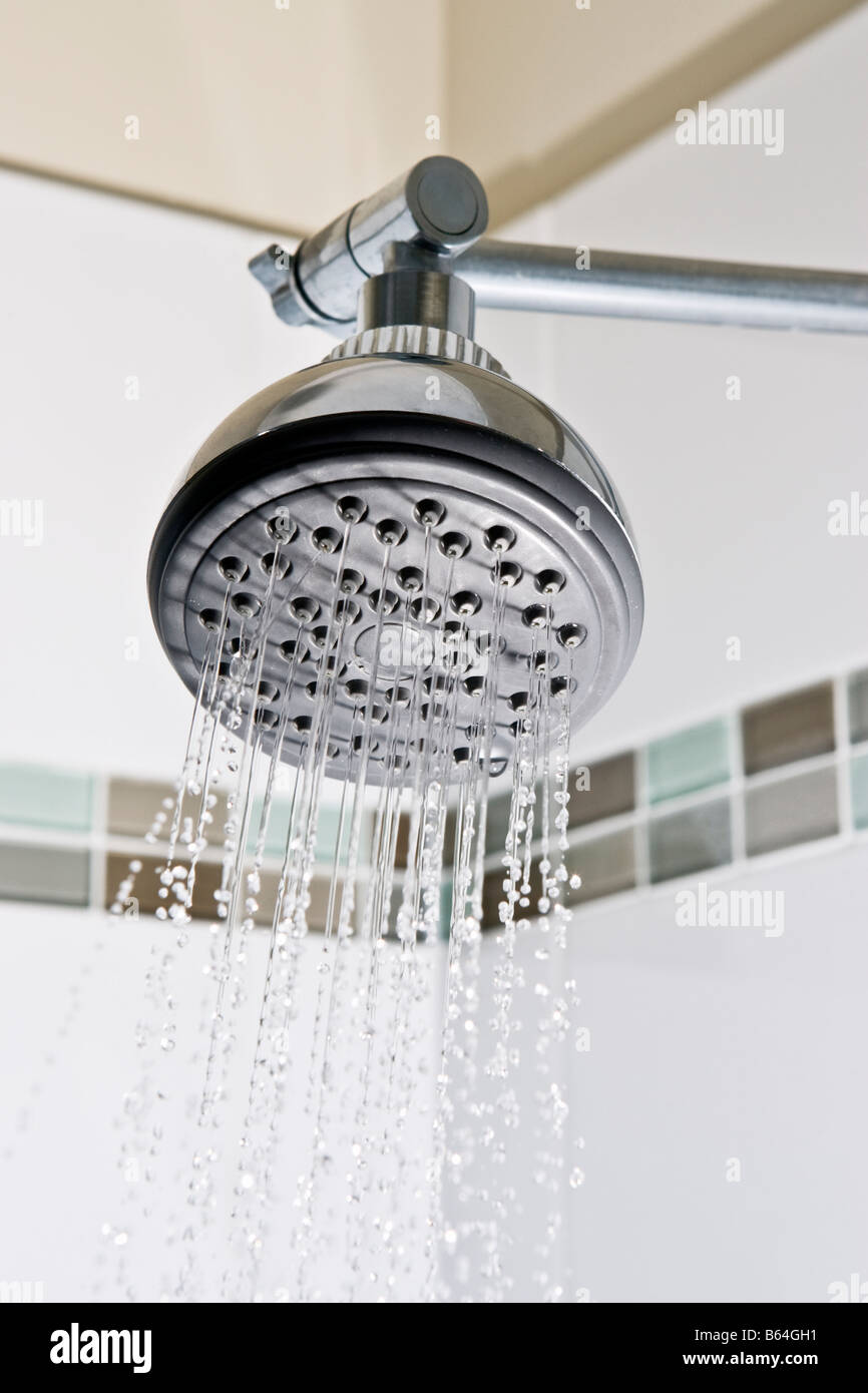 Water pouring from the shower Stock Photo - Alamy