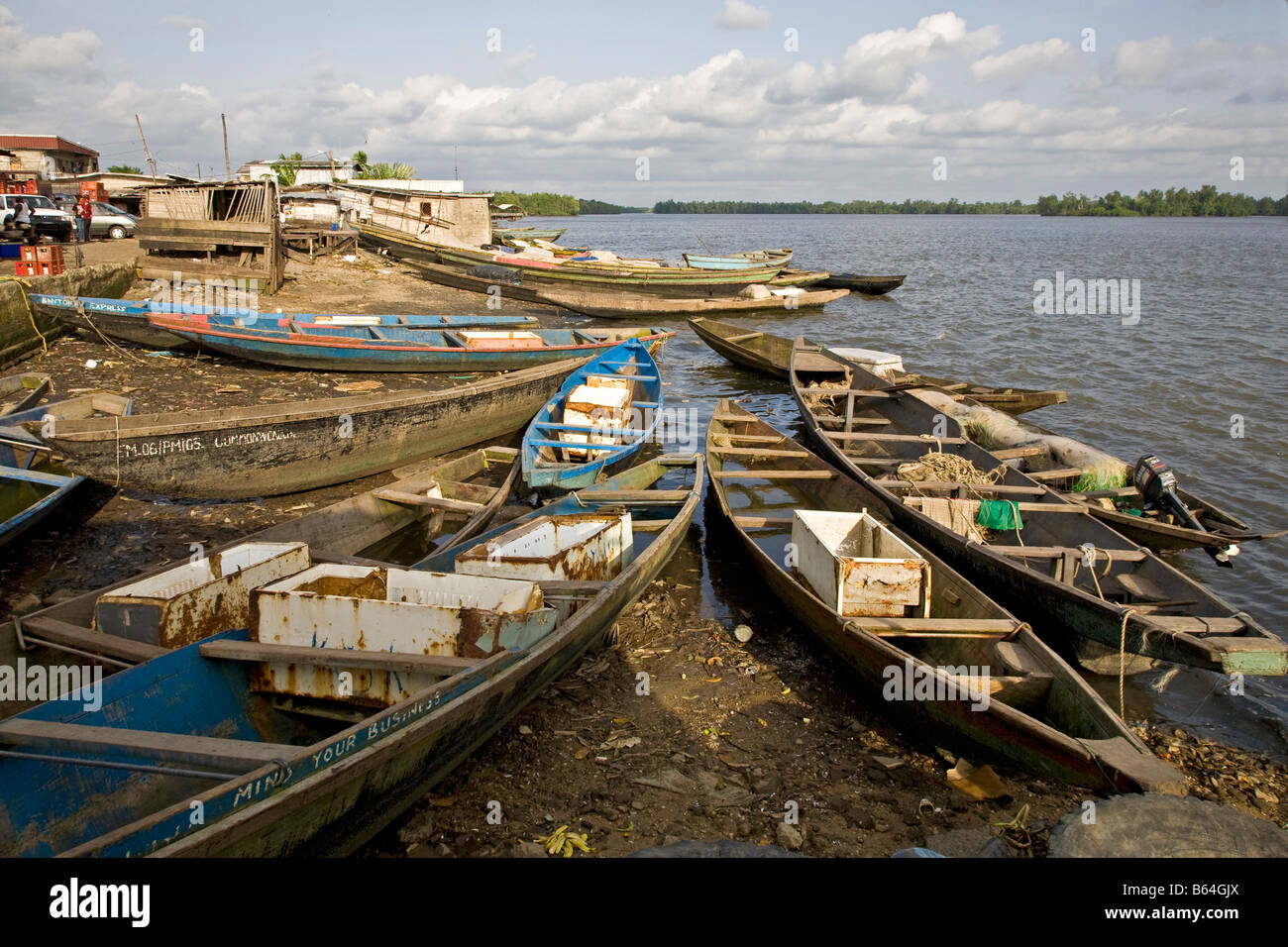 Pirogues on beach at Wouri River, Douala, Cameroon, Africa Stock Photo ...