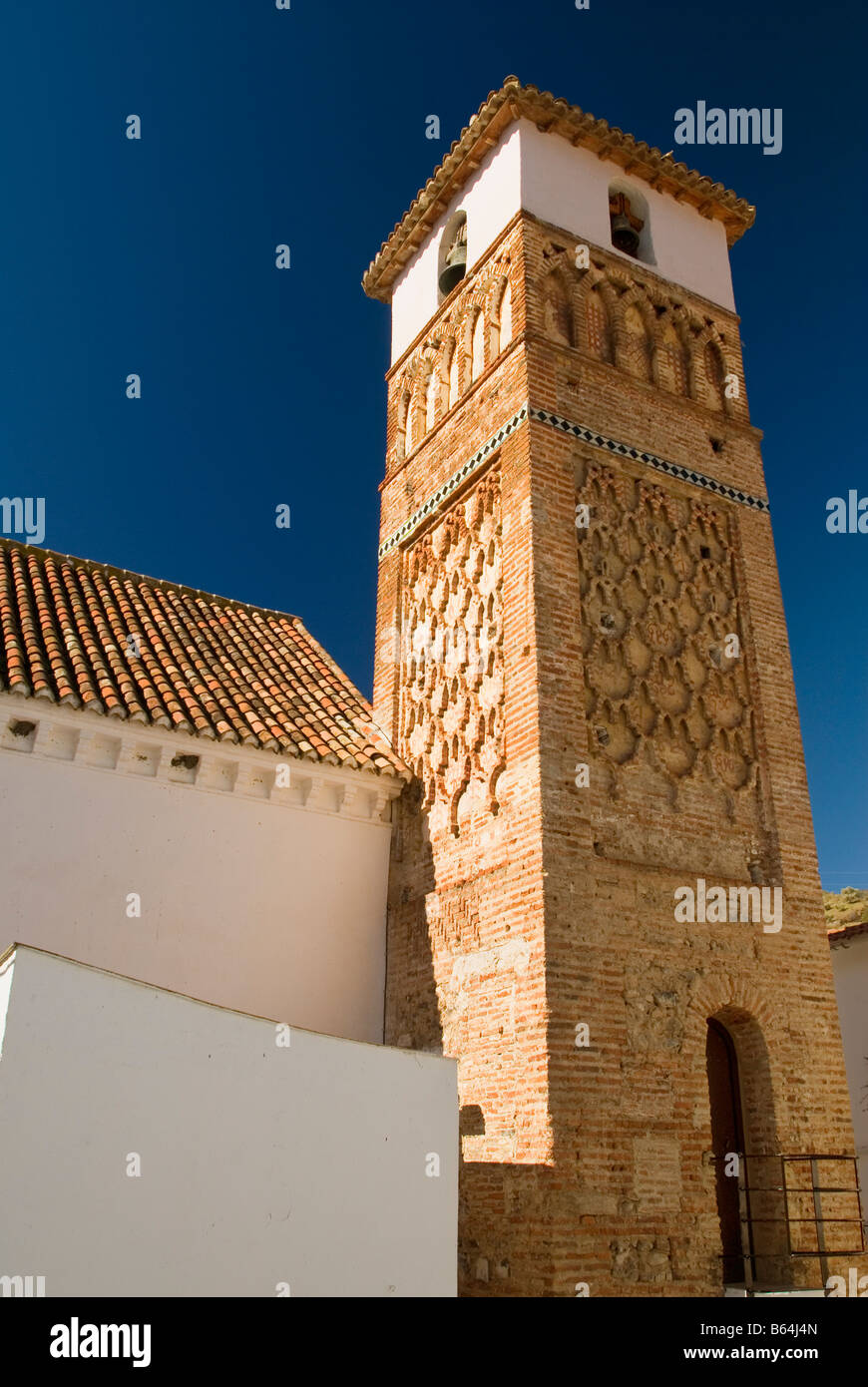 Minaret tower of the Iglesia de la Encarnación church Archez Village ...