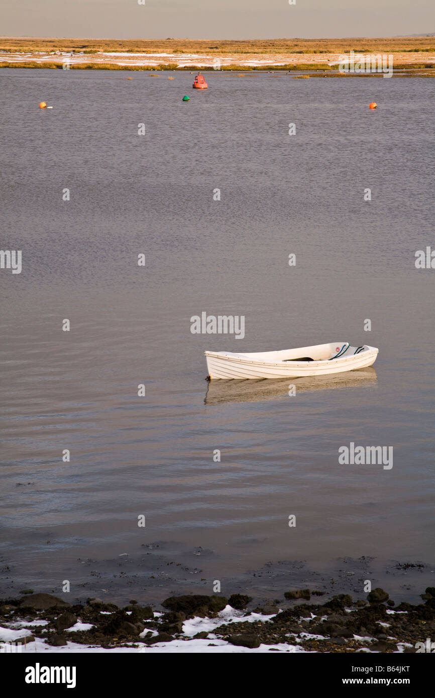 small white dinghy afloat near harbour Stock Photo - Alamy