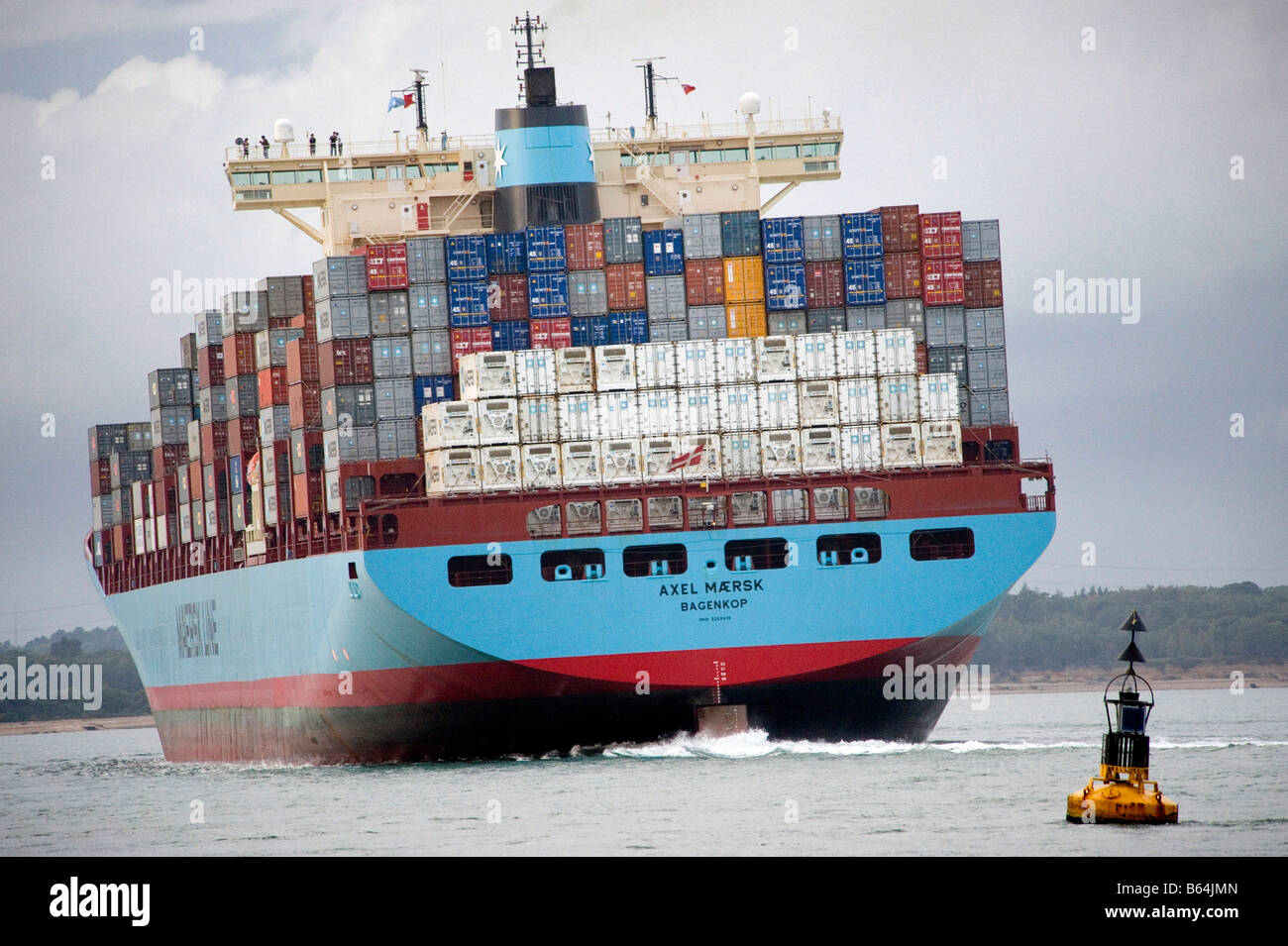 Container ship rounds the Bramble Bank north of the Cardinal Mark off ...