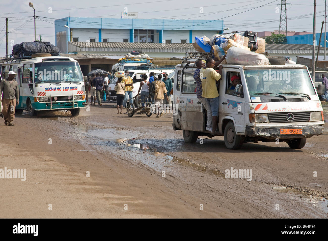 Minibus terminal and passengers, Douala, Cameroon, Africa Stock Photo ...