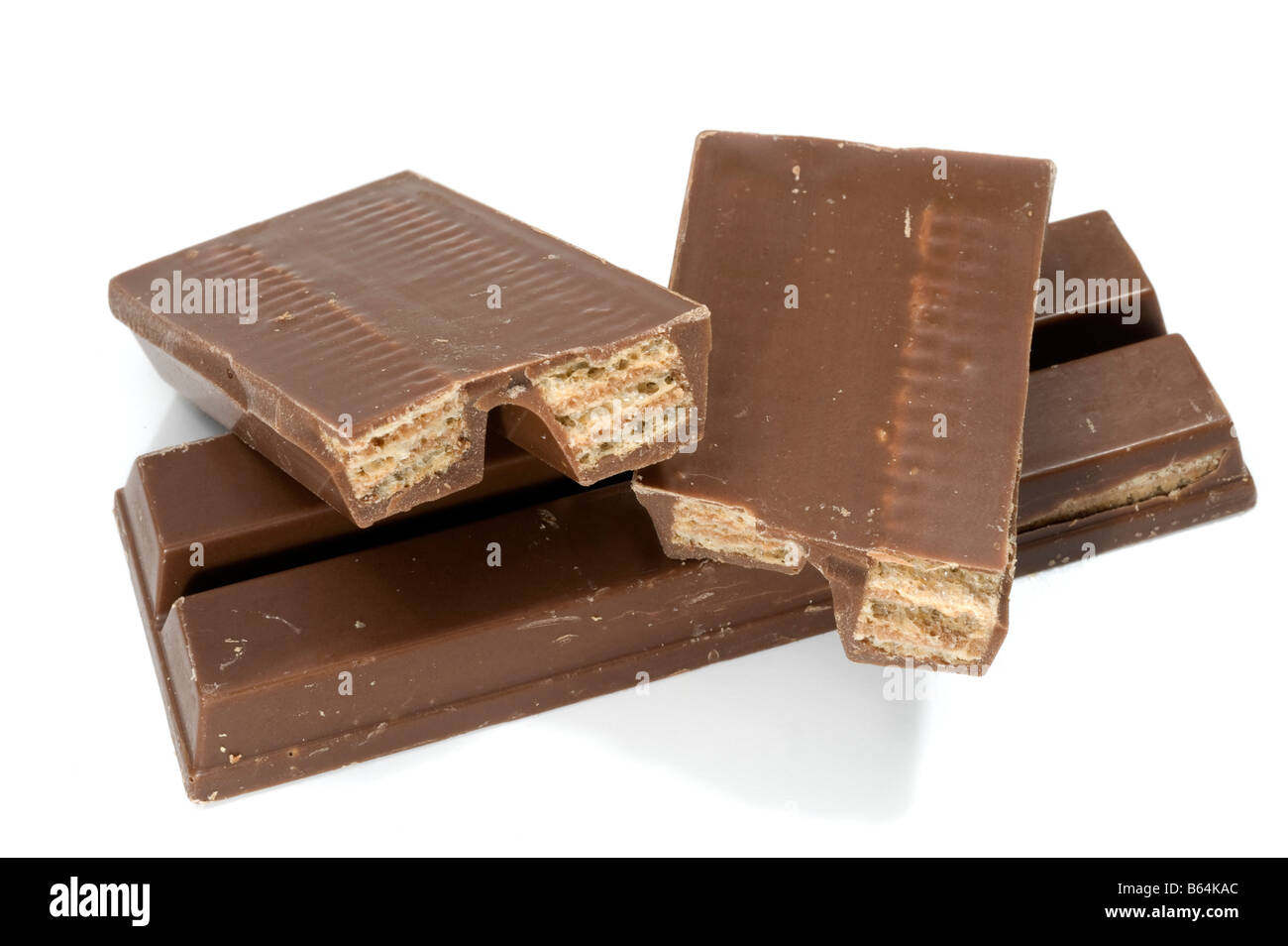 Four milk "chocolate covered" wafer finger biscuits Stock Photo - Alamy