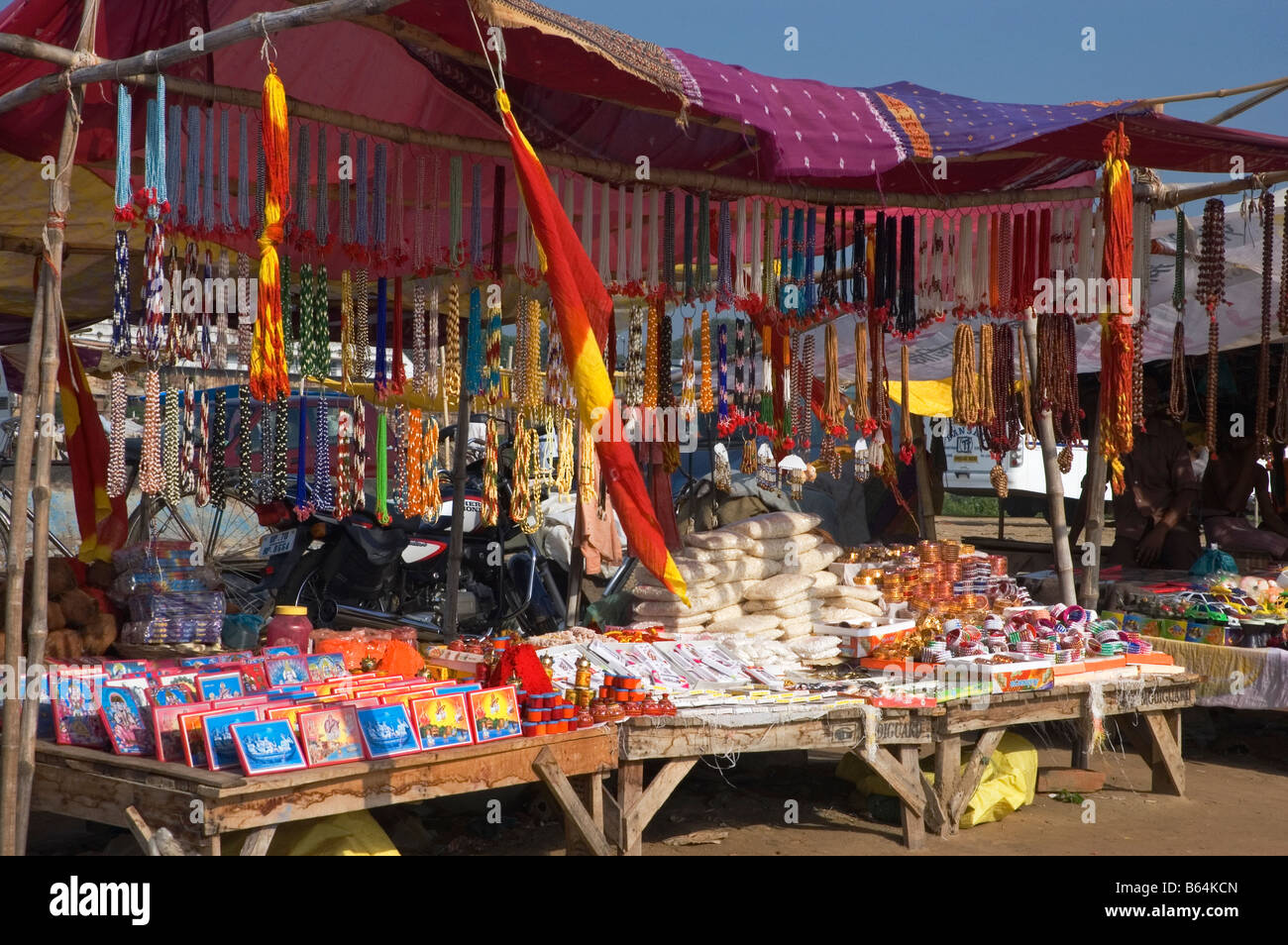 Trinket stall on the banks of the Ganges River at the sangam at ...
