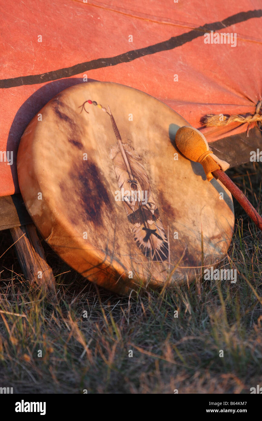 A Native American Indian painted drum against a tipi Stock Photo - Alamy