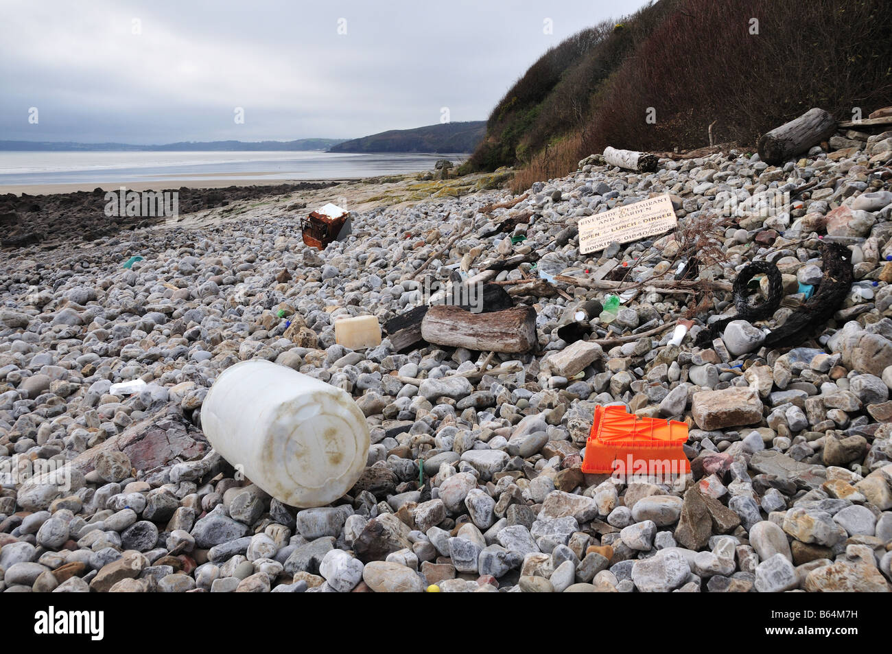 Litter on Marros Beach Carmarthenshire Wales Stock Photo - Alamy