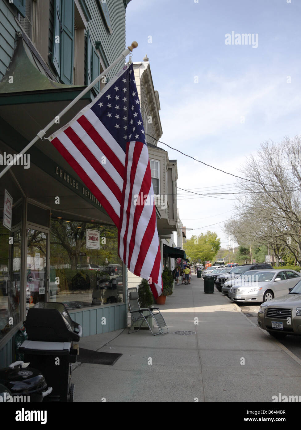 An American flag draped on a typical Main Street,USA Stock Photo - Alamy