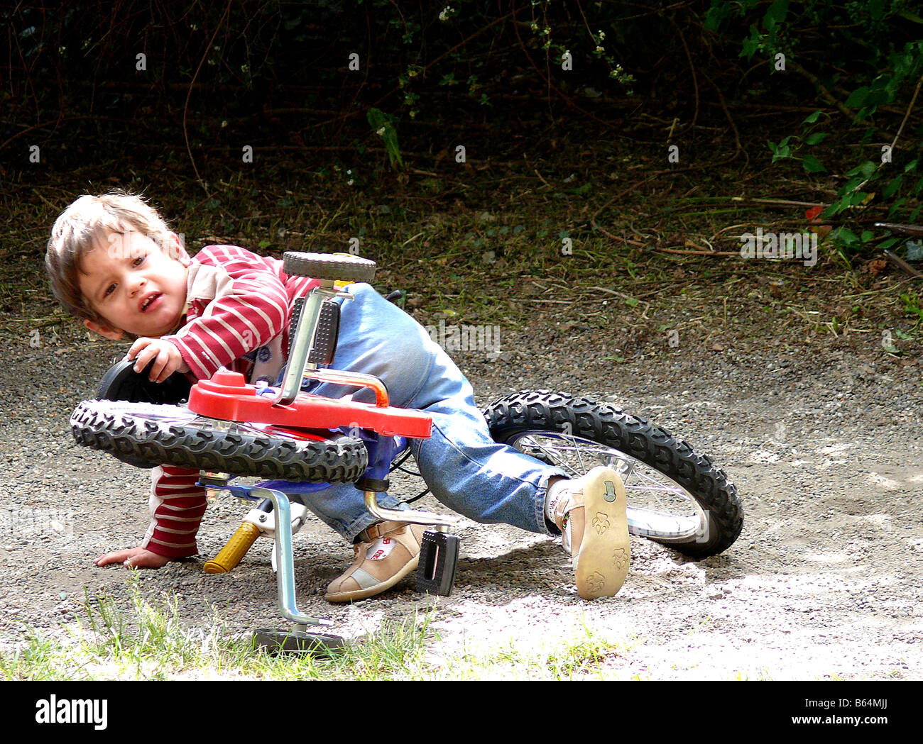 Child Falling Bicycle Stock Photos & Child Falling Bicycle Stock Images ...