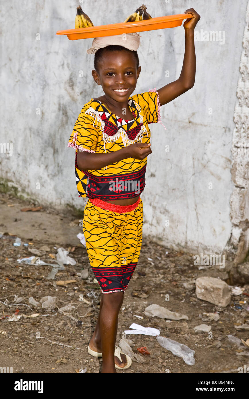 Girl in traditional dress in village, Douala, Cameroon, Africa Stock ...