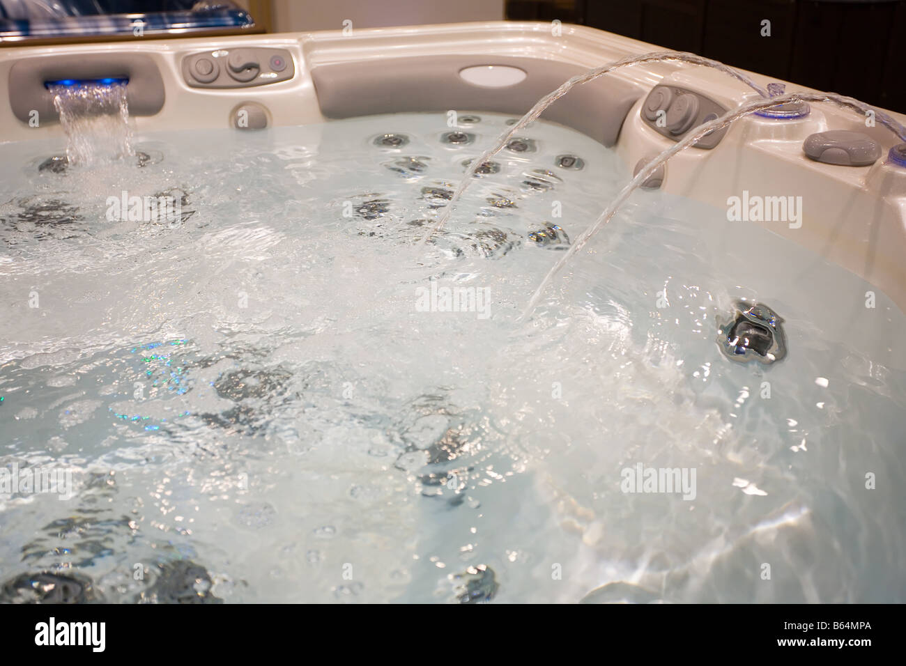 white jacuzzi with full of water Stock Photo - Alamy