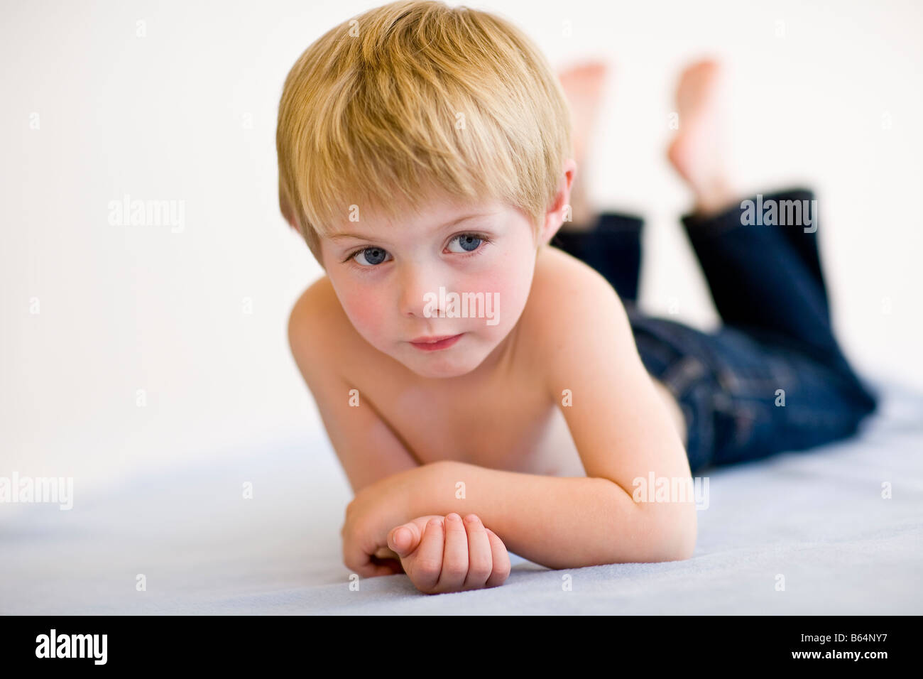 Propped on elbows hi-res stock photography and images - Alamy