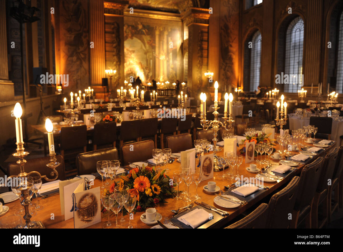 Banqueting table for evening dinner Stock Photo - Alamy