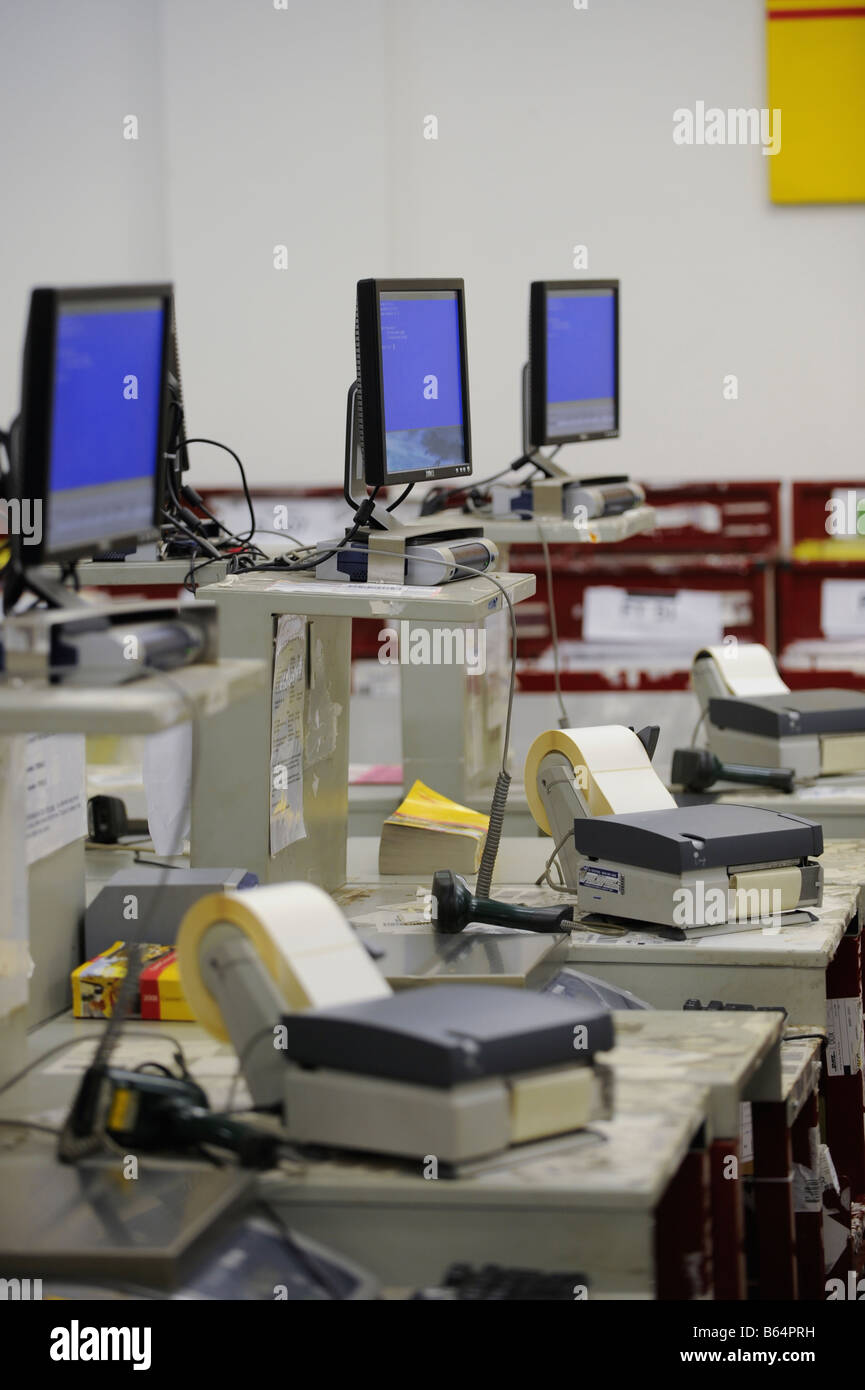 DHL distribution and sorting area for parcels in the UK Stock Photo - Alamy
