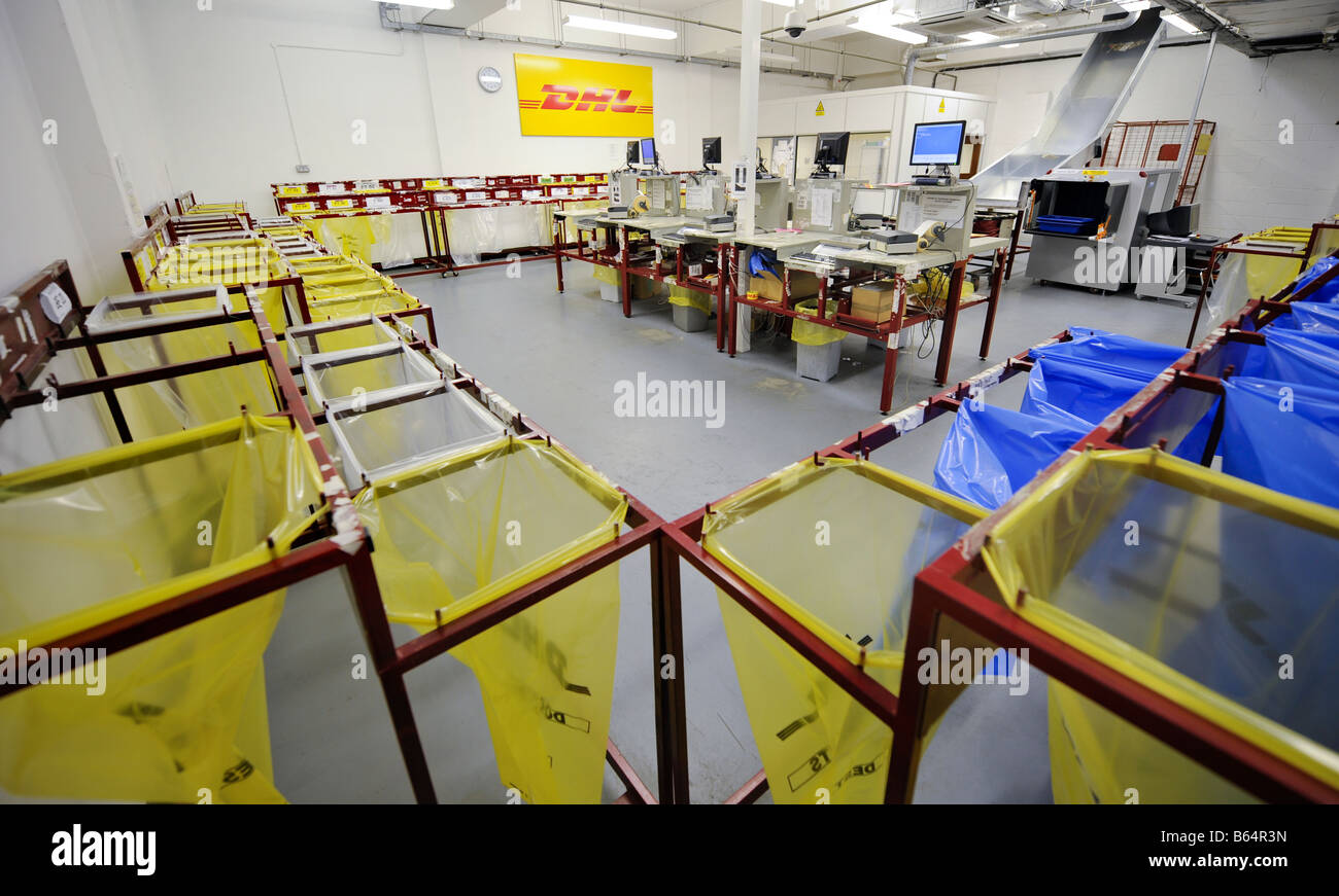DHL distribution and sorting area for parcels in the UK Stock Photo - Alamy