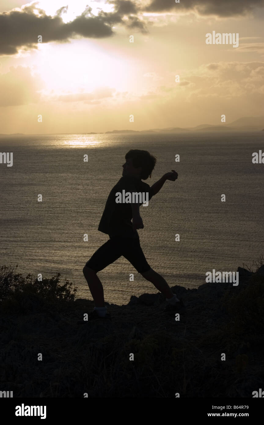 Boy stone throw hi-res stock photography and images - Alamy