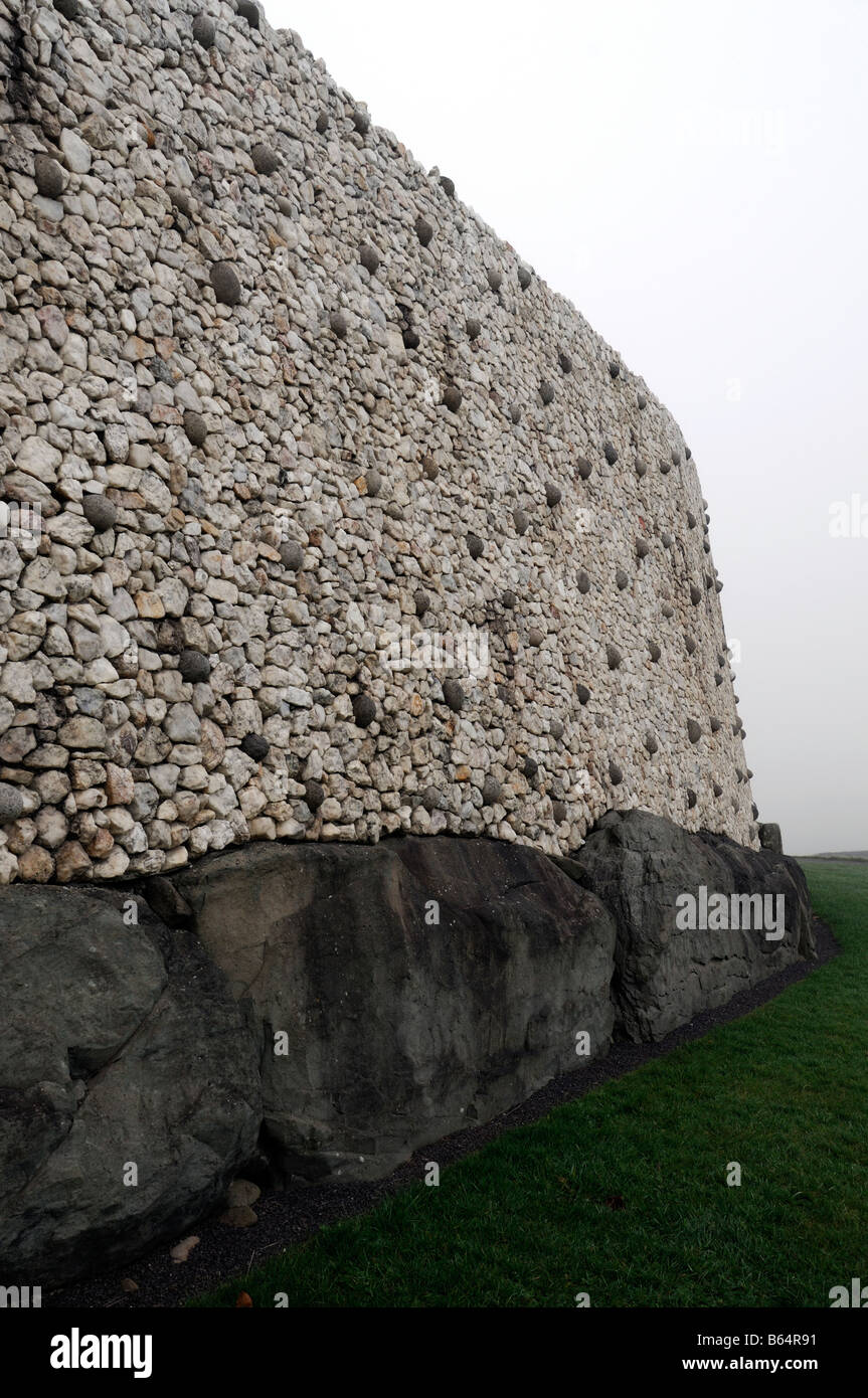 Newgrange passage tomb and standing stones on a very foggy freezing ...
