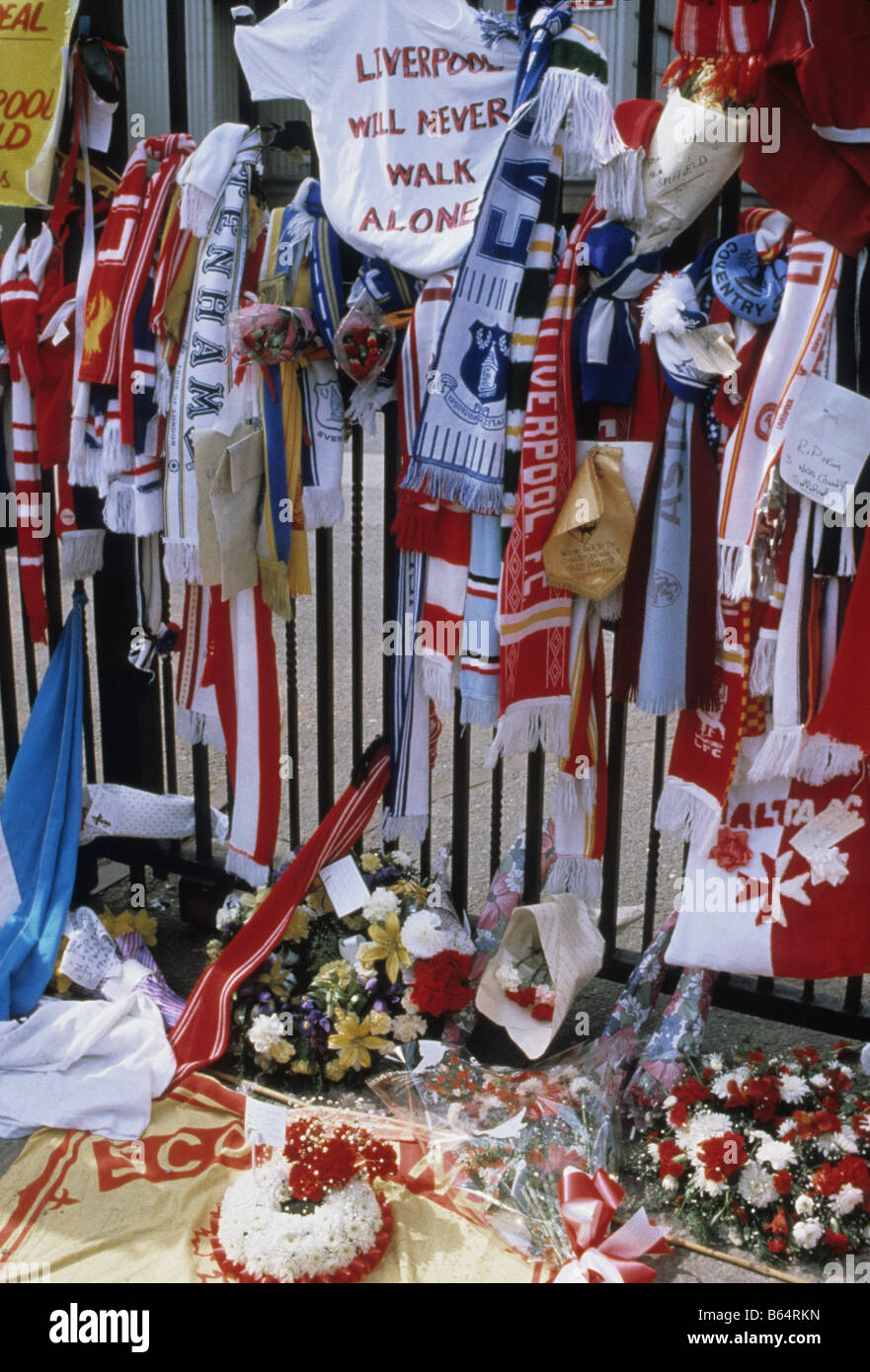 Tributes and momentoes left at the main gates of Anfield after the ...