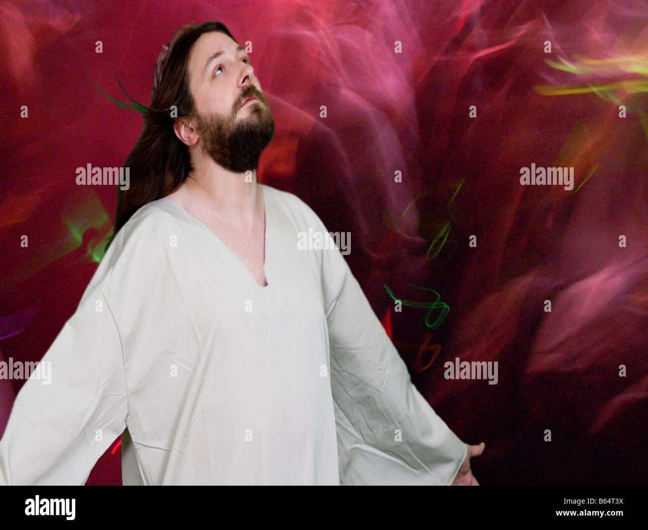 Jesus profile with red background Stock Photo - Alamy
