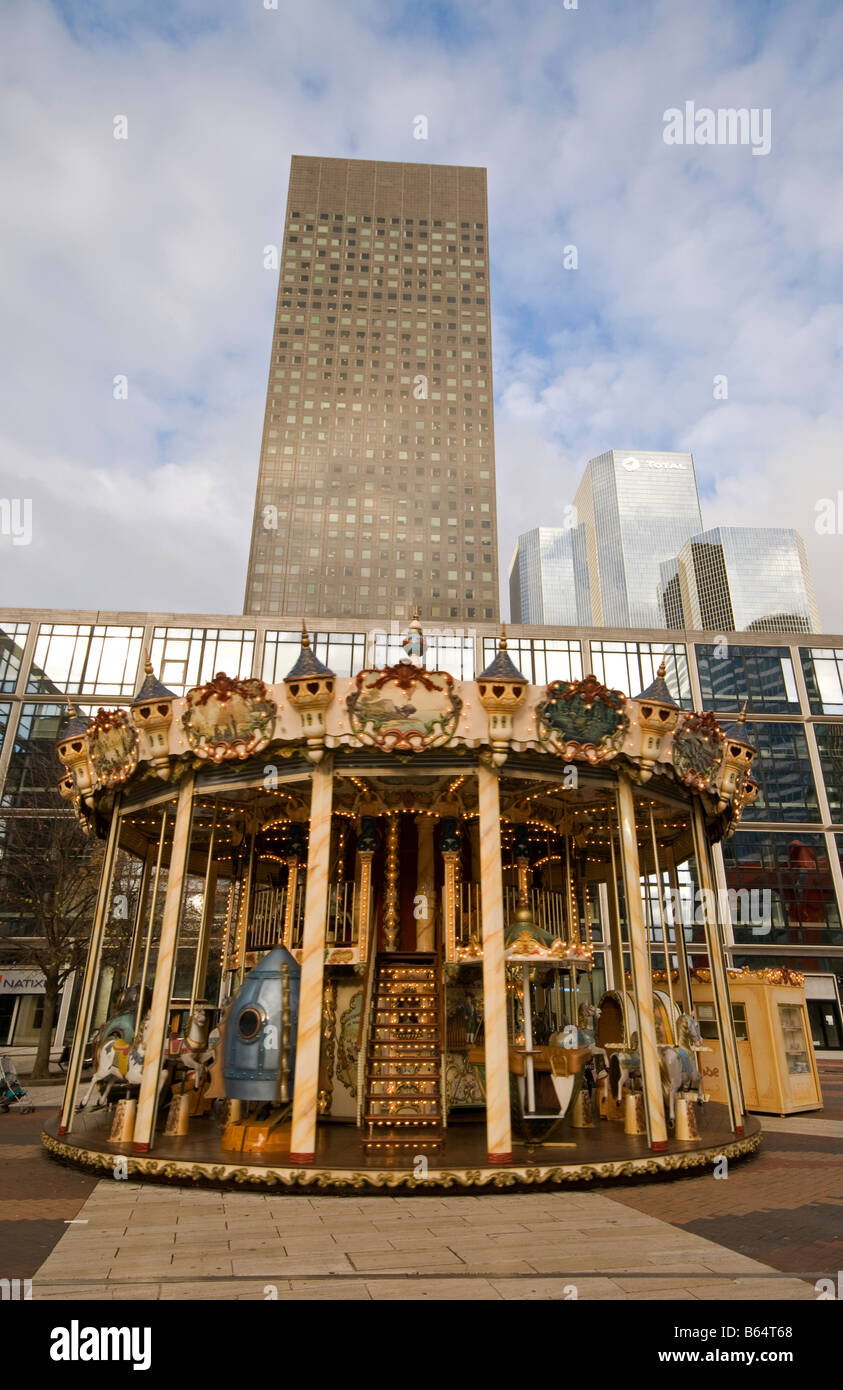Merry-go-round in front of high-rise buildings at la Défense, in Paris ...