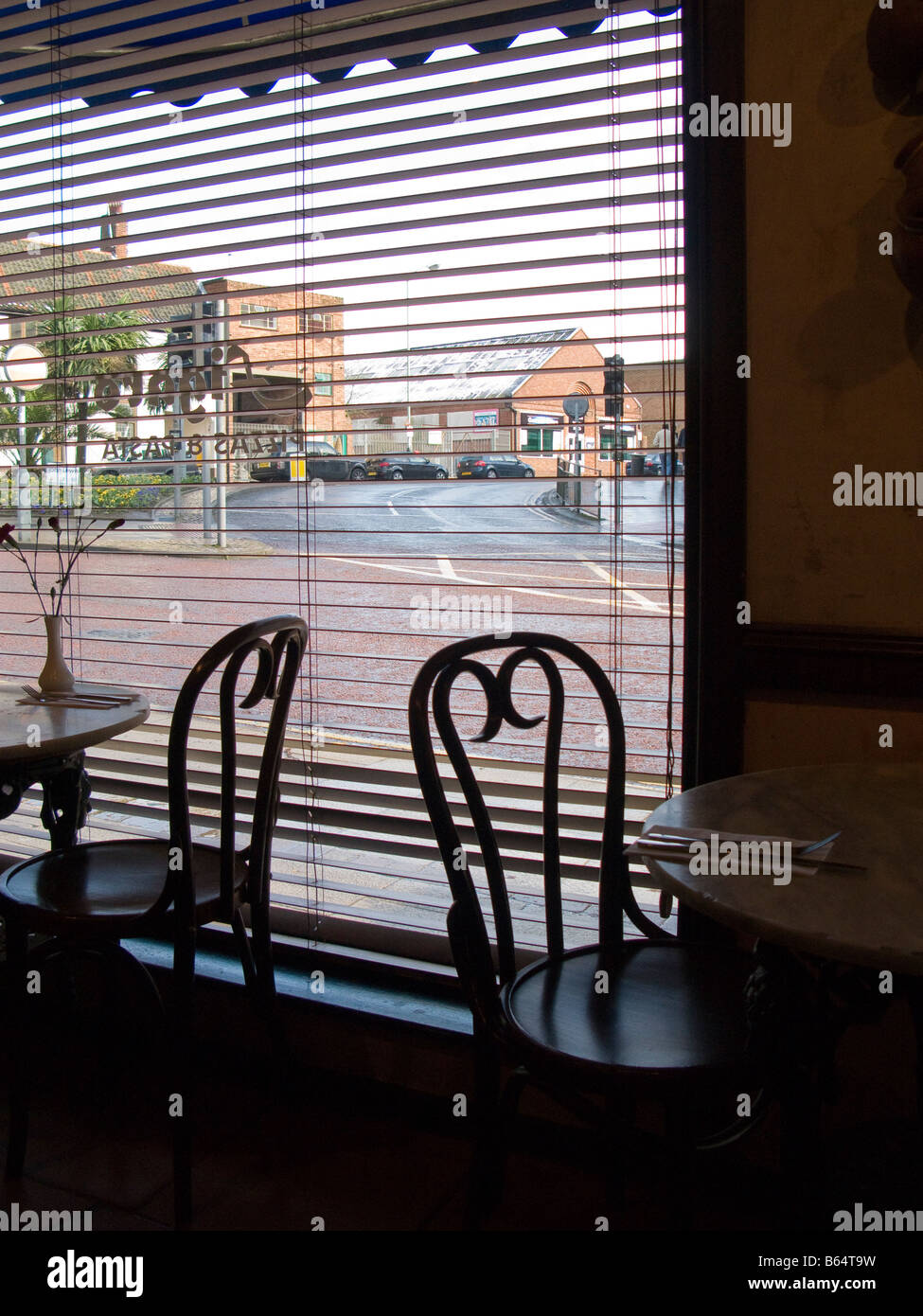 Two Empty Wooden Chairs in Restaurant Stock Photo - Alamy