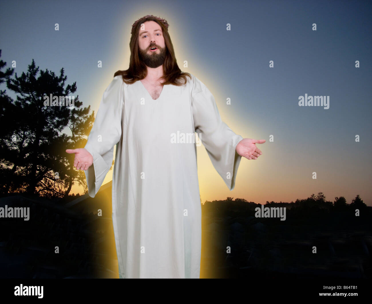 Jesus stands during sunset Stock Photo - Alamy