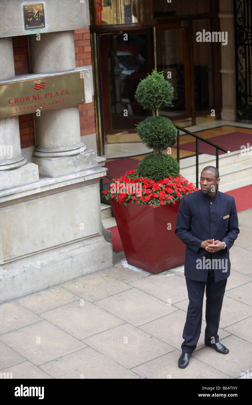 Concierge staff at London Hotel Crowne Plaza Stock Photo - Alamy