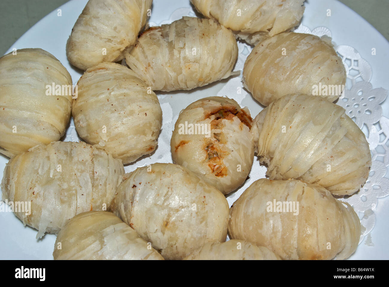 Dim sum lunch of flaky baked pastry with savory meat filling at the Lu ...