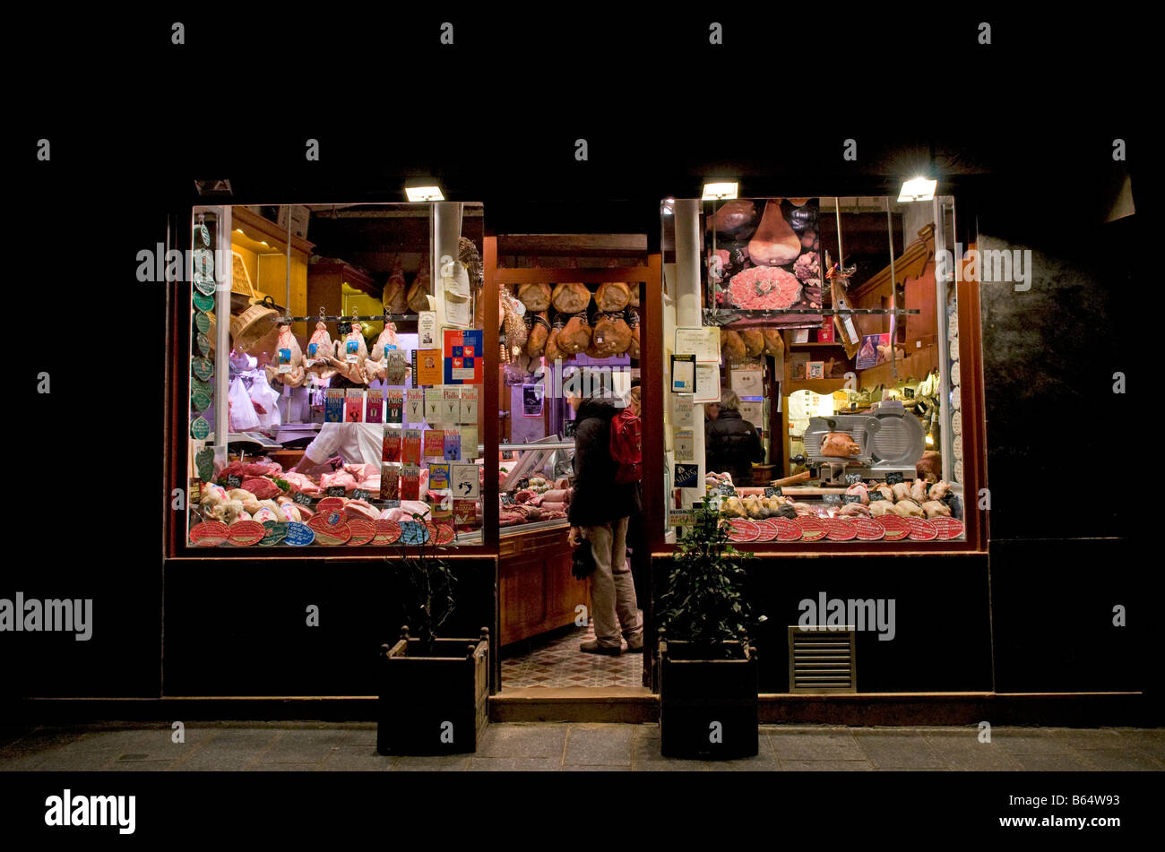 Butcher shop in Paris at night-time Stock Photo - Alamy