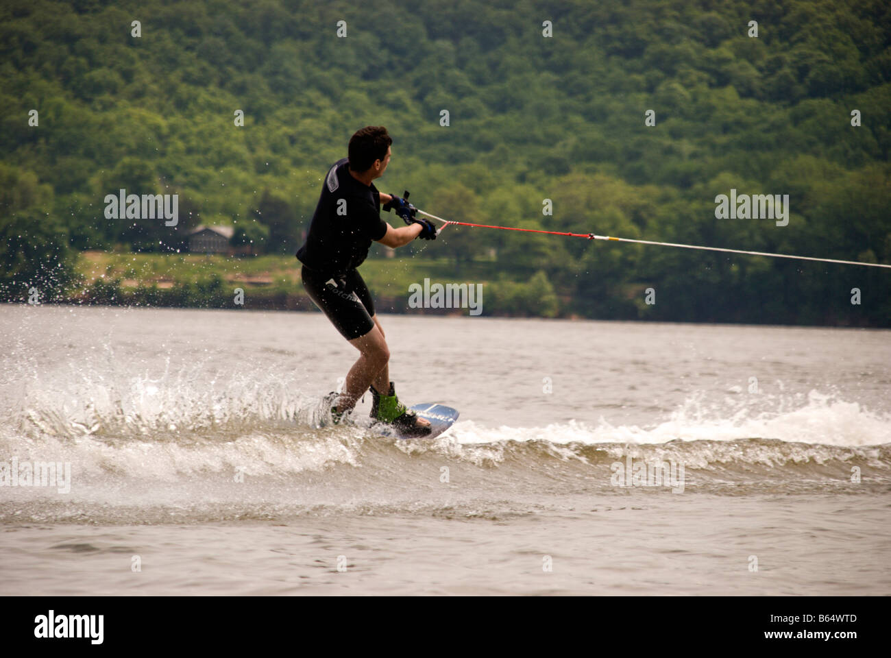 The cold,chilly and choppy waters of the Lake,doesn't prevent this man ...