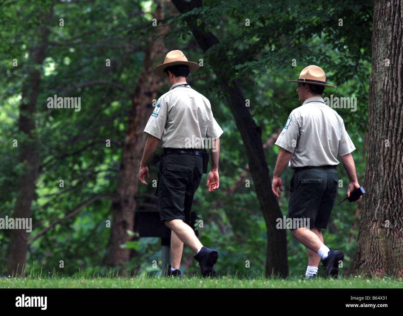 Two park rangers on foot patrol Stock Photo - Alamy